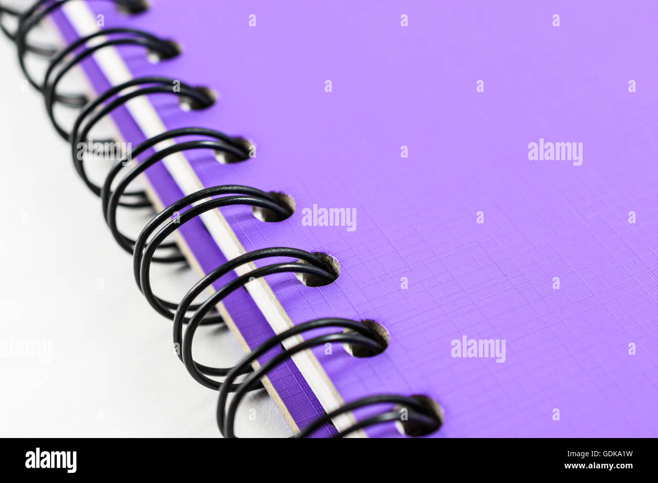 closeup purple notebook on white background Stock Photo - Alamy