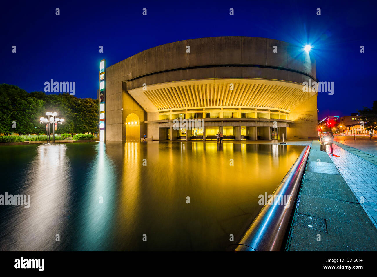 Building and reflecting pool at the Christian Science Plaza at night ...