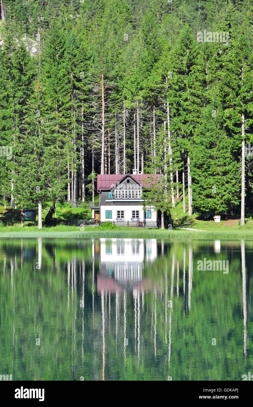 House in forest, Dolomites, Italy Stock Photo - Alamy