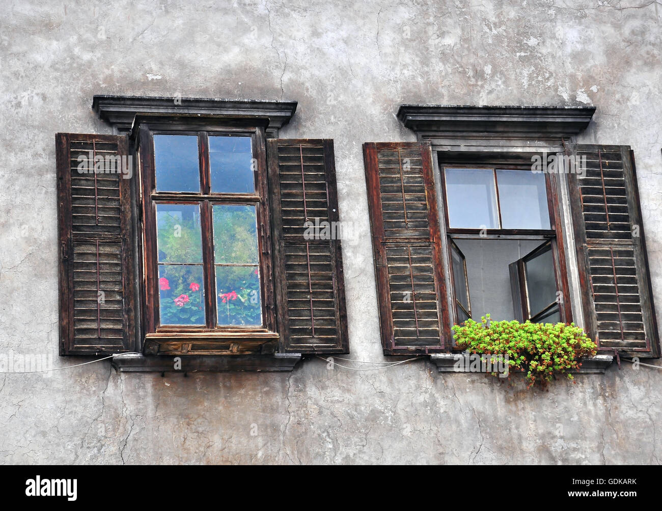 Wooden windows with shutters Stock Photo - Alamy