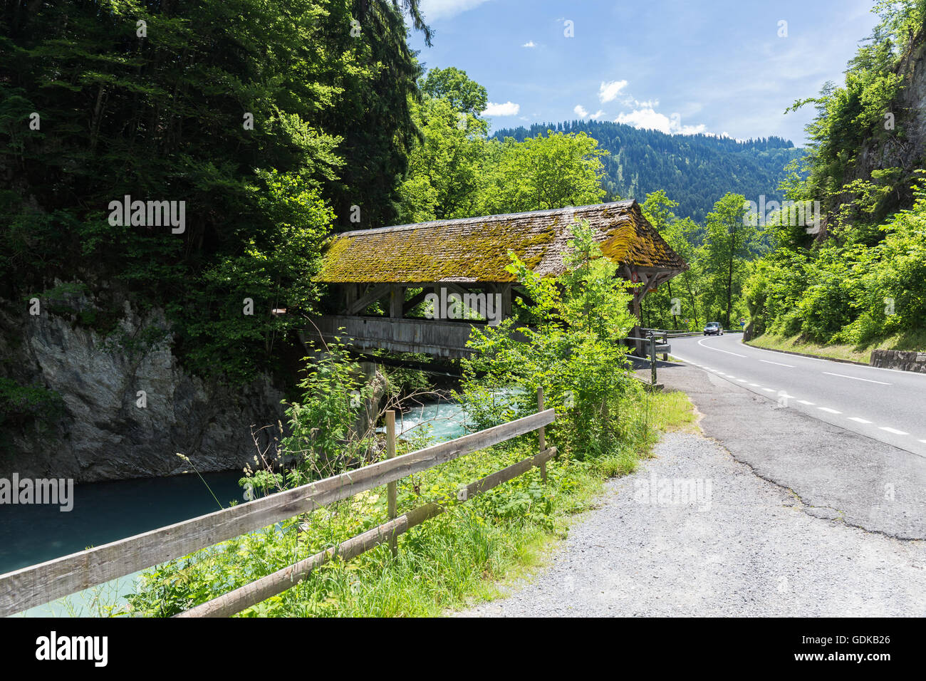Traditional Covered Wood Bridge in mountain Switzerland Stock Photo - Alamy