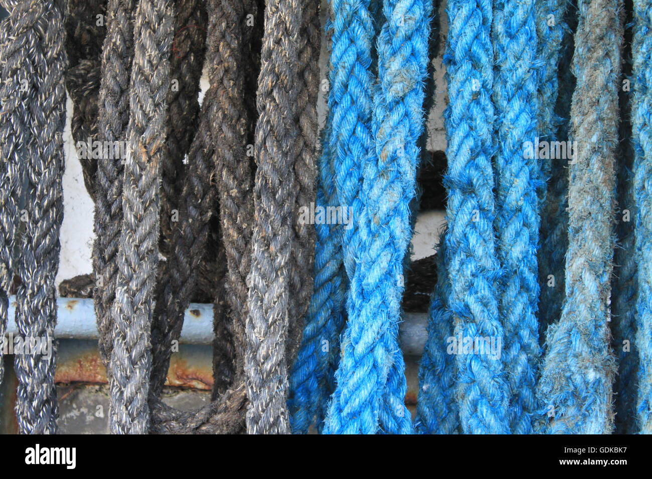 harbourside fishing equipment old nets ropes fenders Stock Photo - Alamy