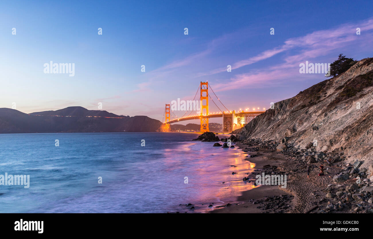 Golden Gate Bridge, evening light, Marshall's Beach, rocky coast, San ...