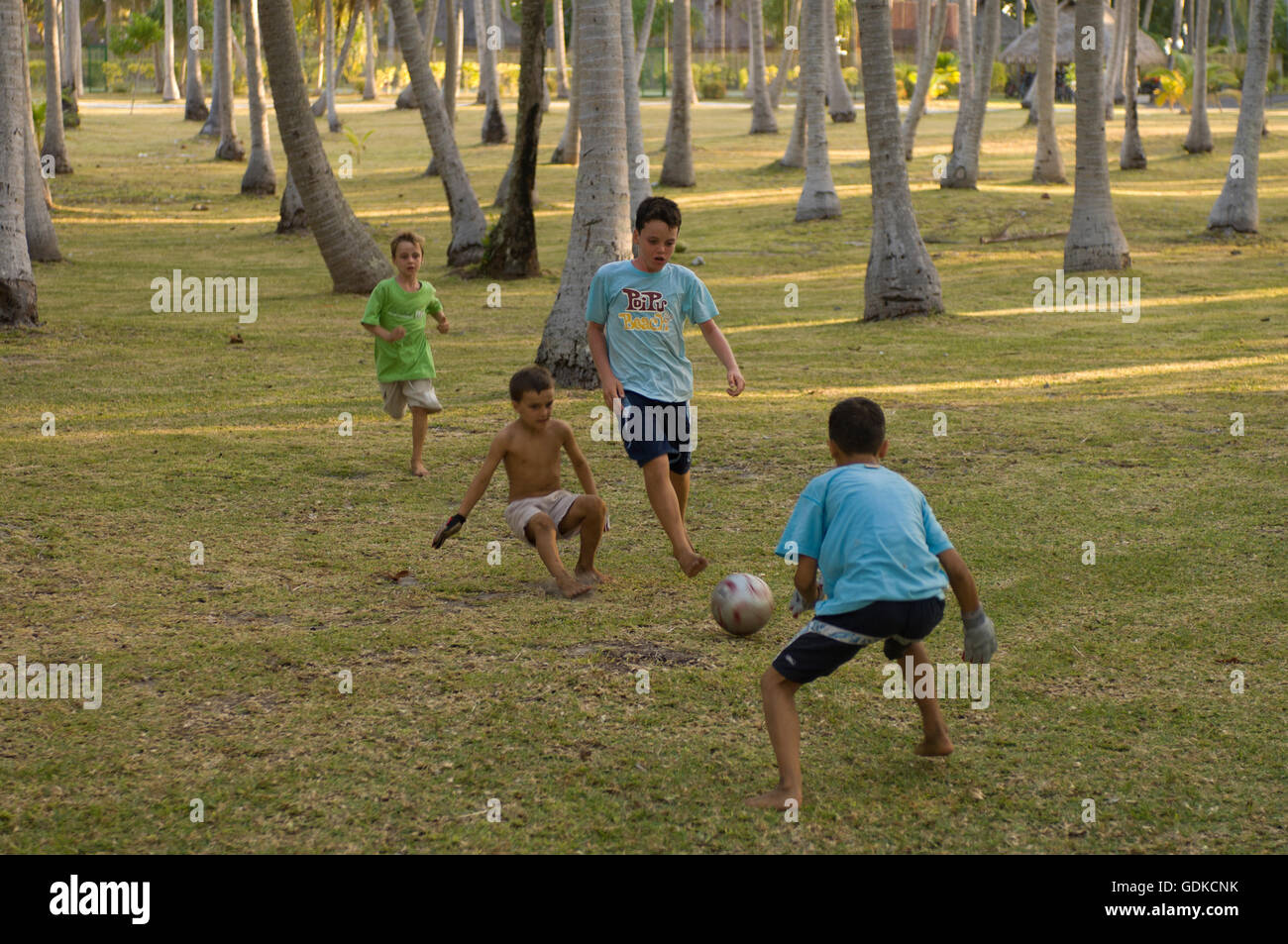 Kids playing "coco soccer", Rangiroa, Tuamotu Archipelago, French ...