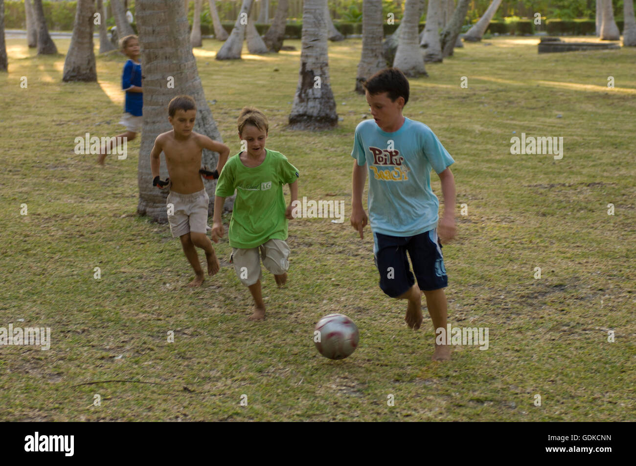 Kids playing "coco soccer", Rangiroa, Tuamotu Archipelago, French ...