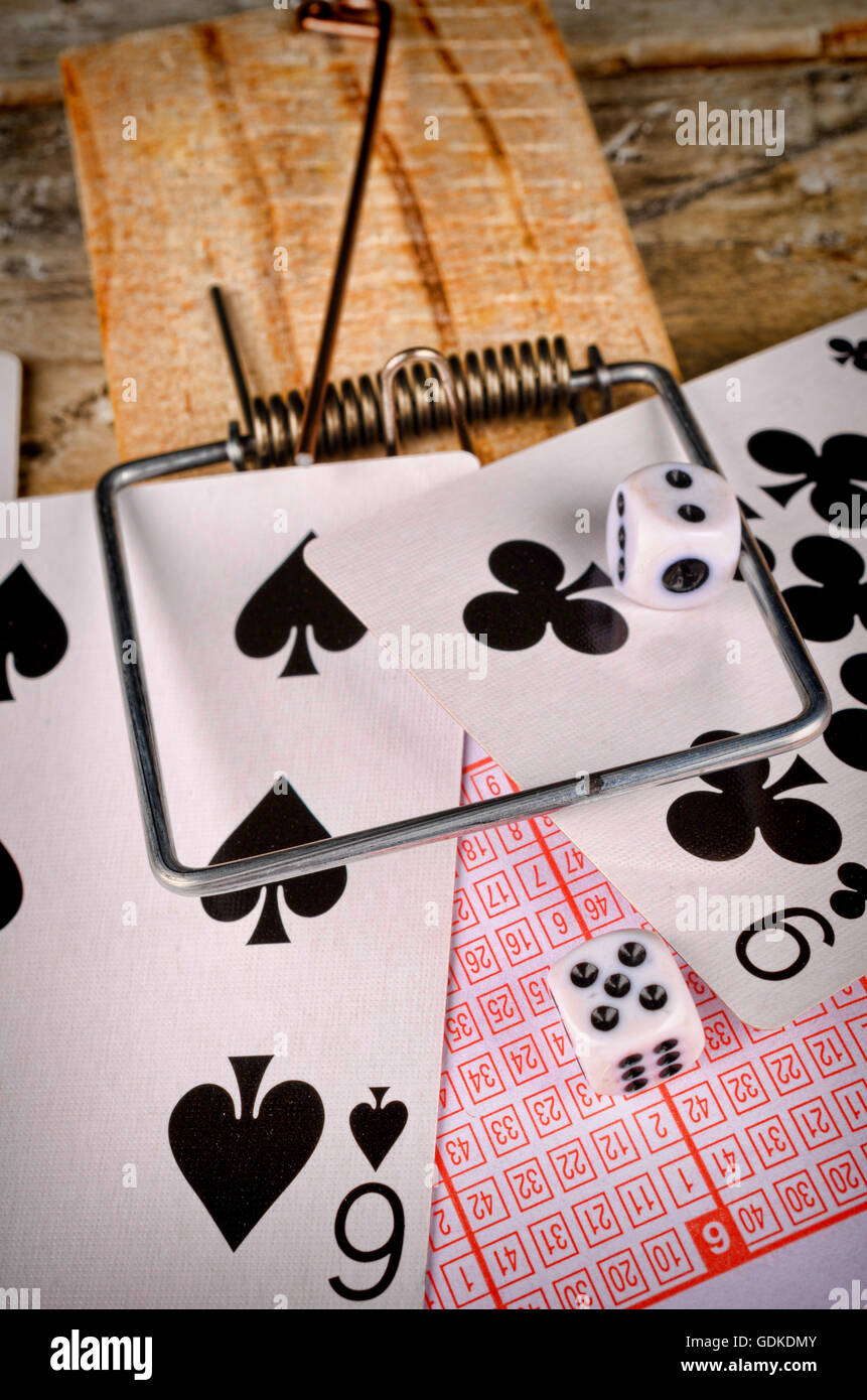 Assorted objects representing addiction to gambling Stock Photo - Alamy