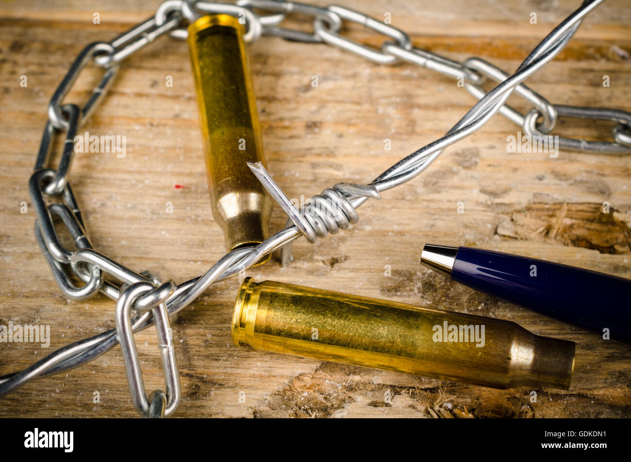 Bullets and barbed wire around a pen, a press freedom concept Stock ...