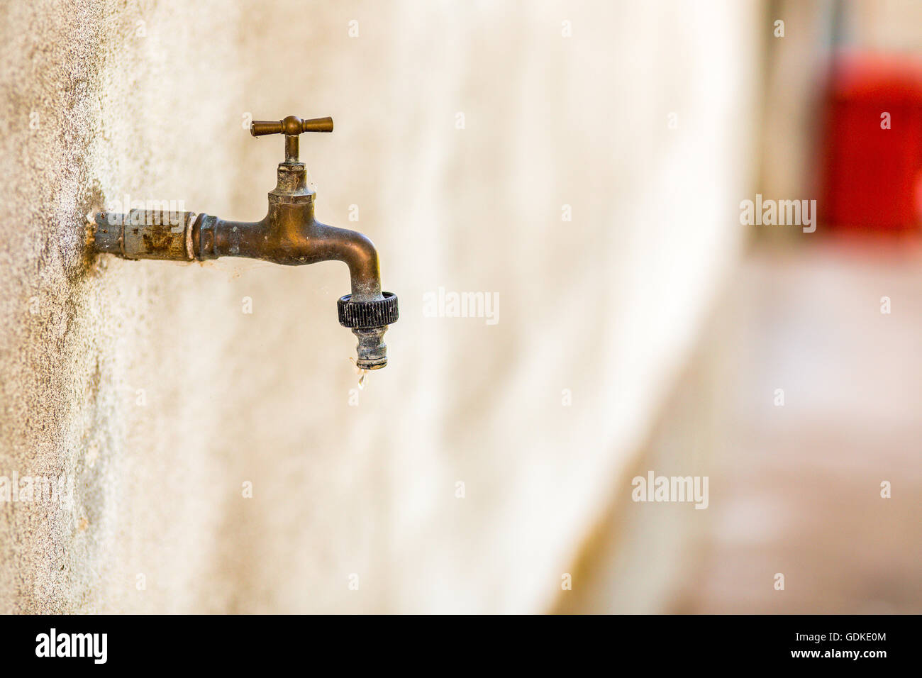 rusty old faucet drips wasting water Stock Photo - Alamy