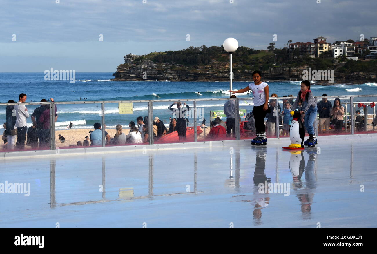 Sydney, Australia - Jul 17, 2016. Girls ice skating on Bondi ice rink ... Sydney, Australia - Jul 17, 2016. Girls ice skating on Bondi ice rink ...