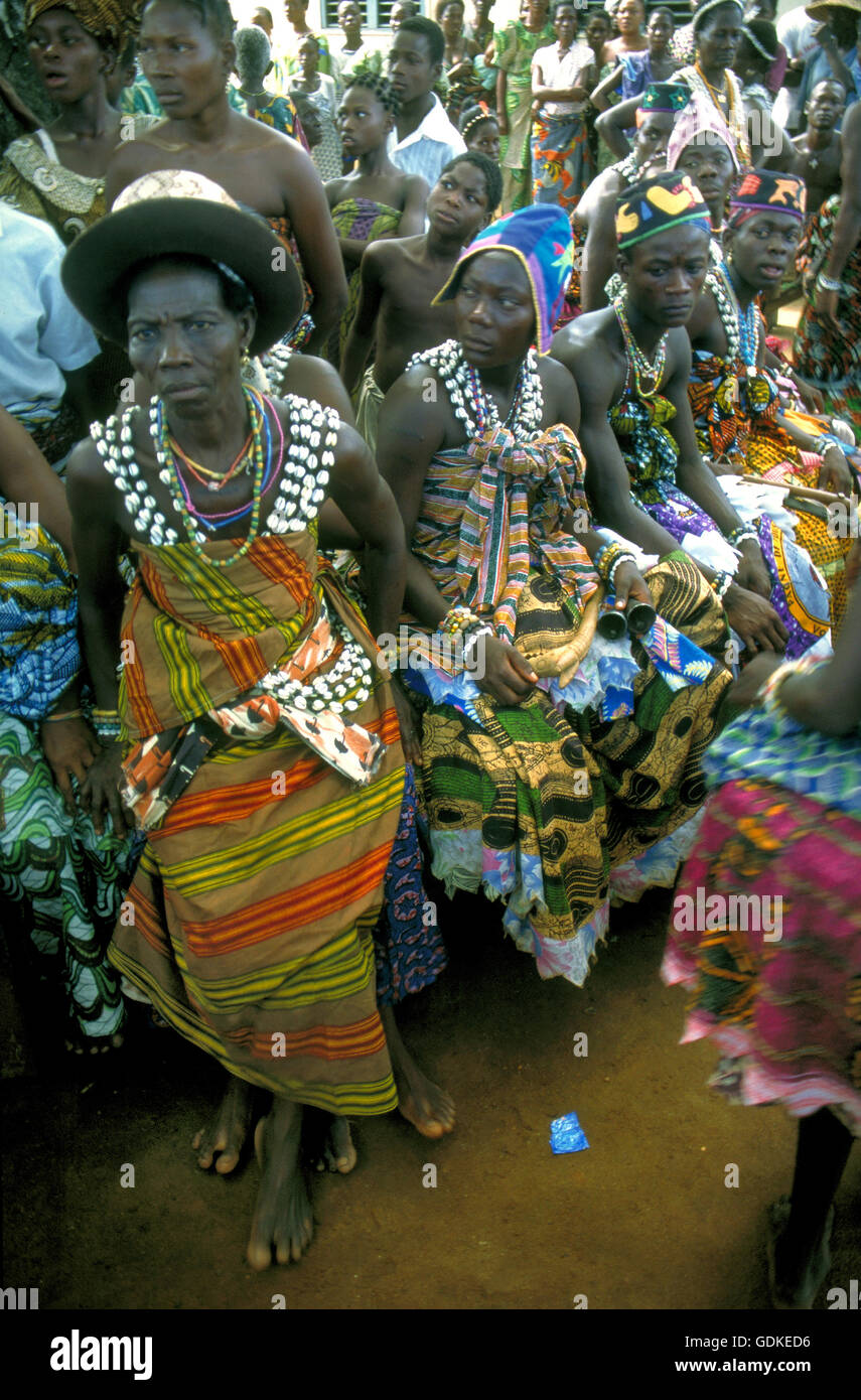 Priests and Priestesses at a Voodoo ceremony prepare to enter into ...