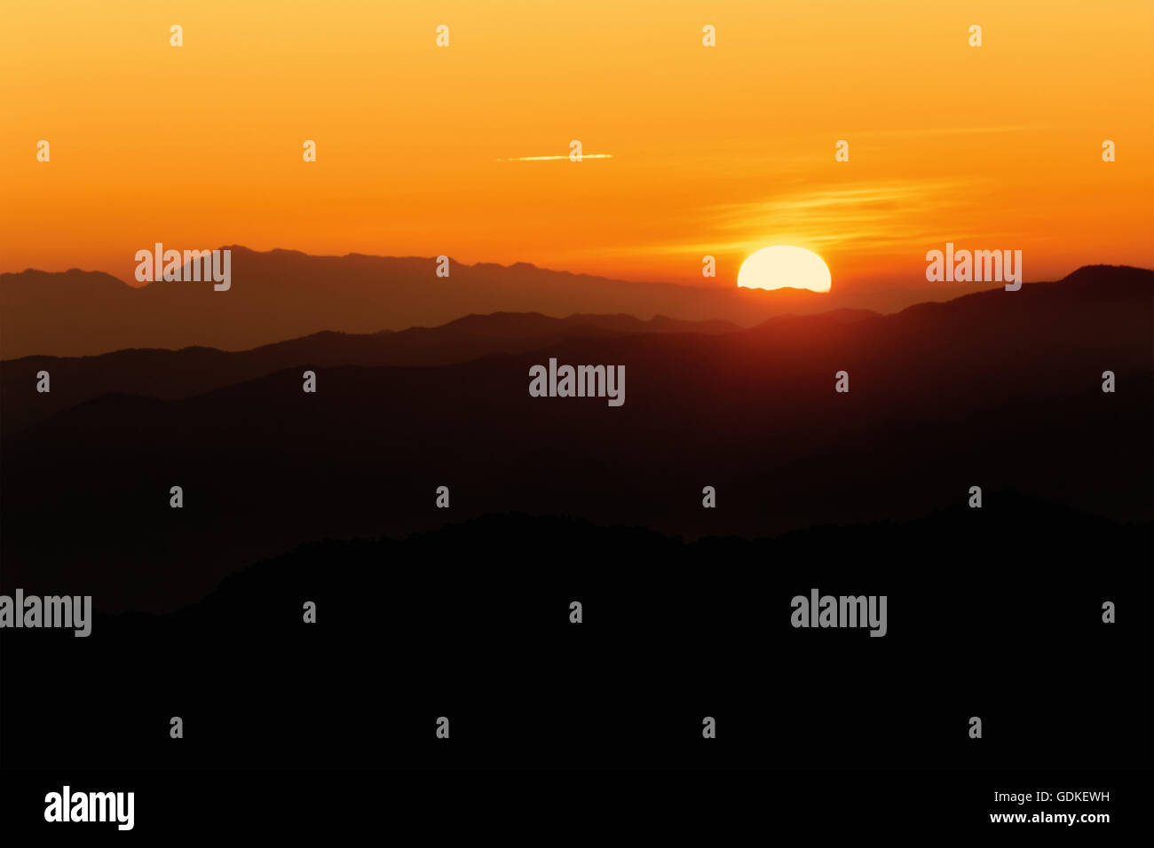 Mountain sunset sky Stock Photo - Alamy