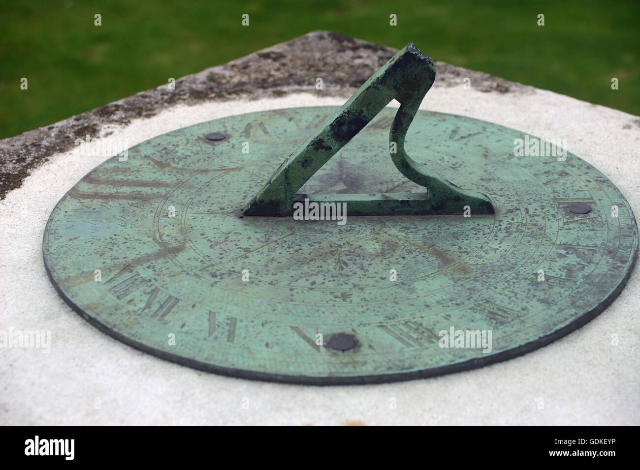 Sundial on plinth Stock Photo - Alamy