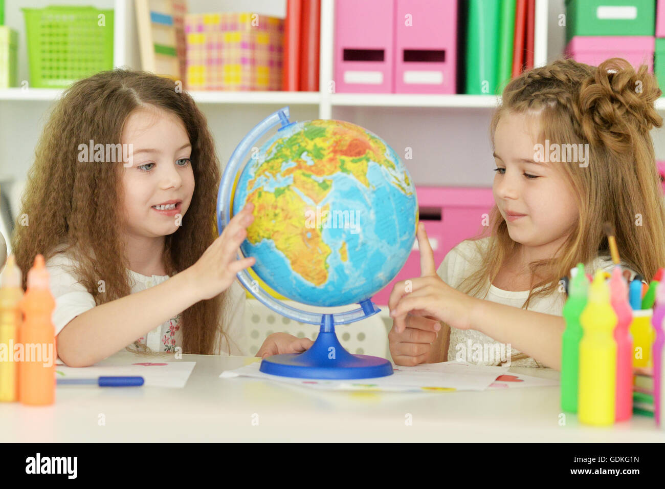 Cute girls on lesson Stock Photo - Alamy