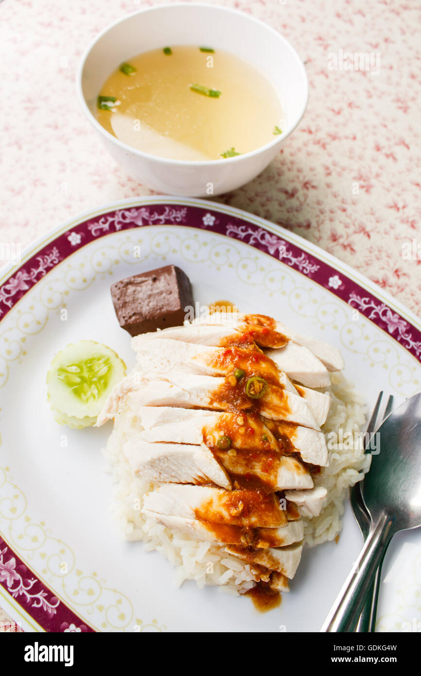 Hainanese chicken rice or Steam chicken with rice Stock Photo - Alamy