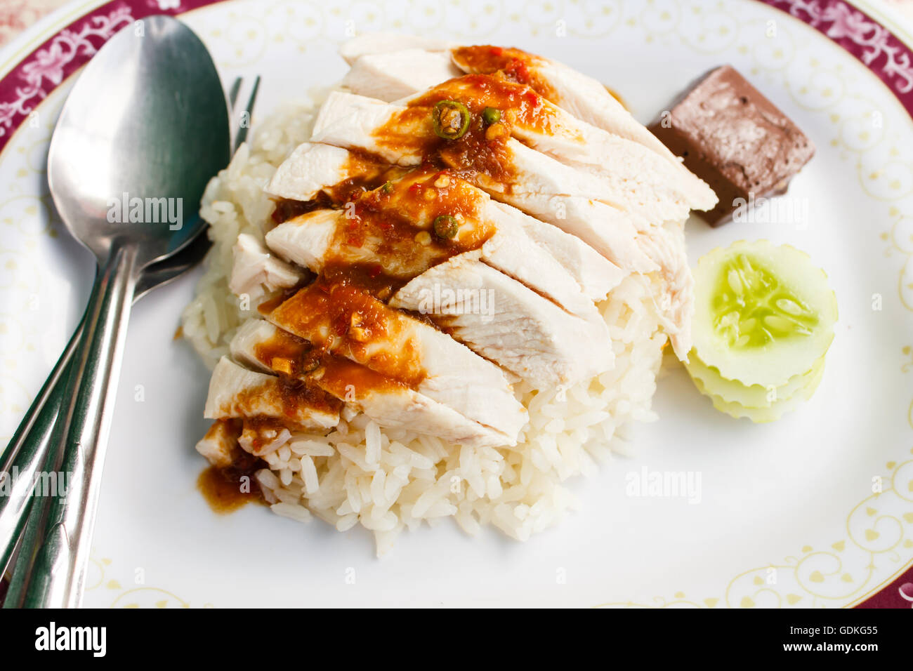 Hainanese chicken rice or Steam chicken with rice Stock Photo - Alamy