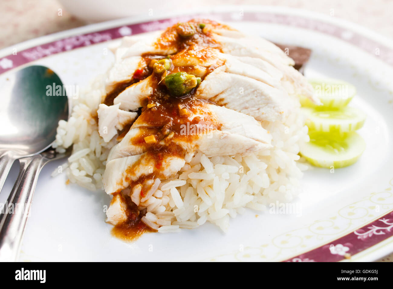 Hainanese chicken rice or Steam chicken with rice Stock Photo - Alamy