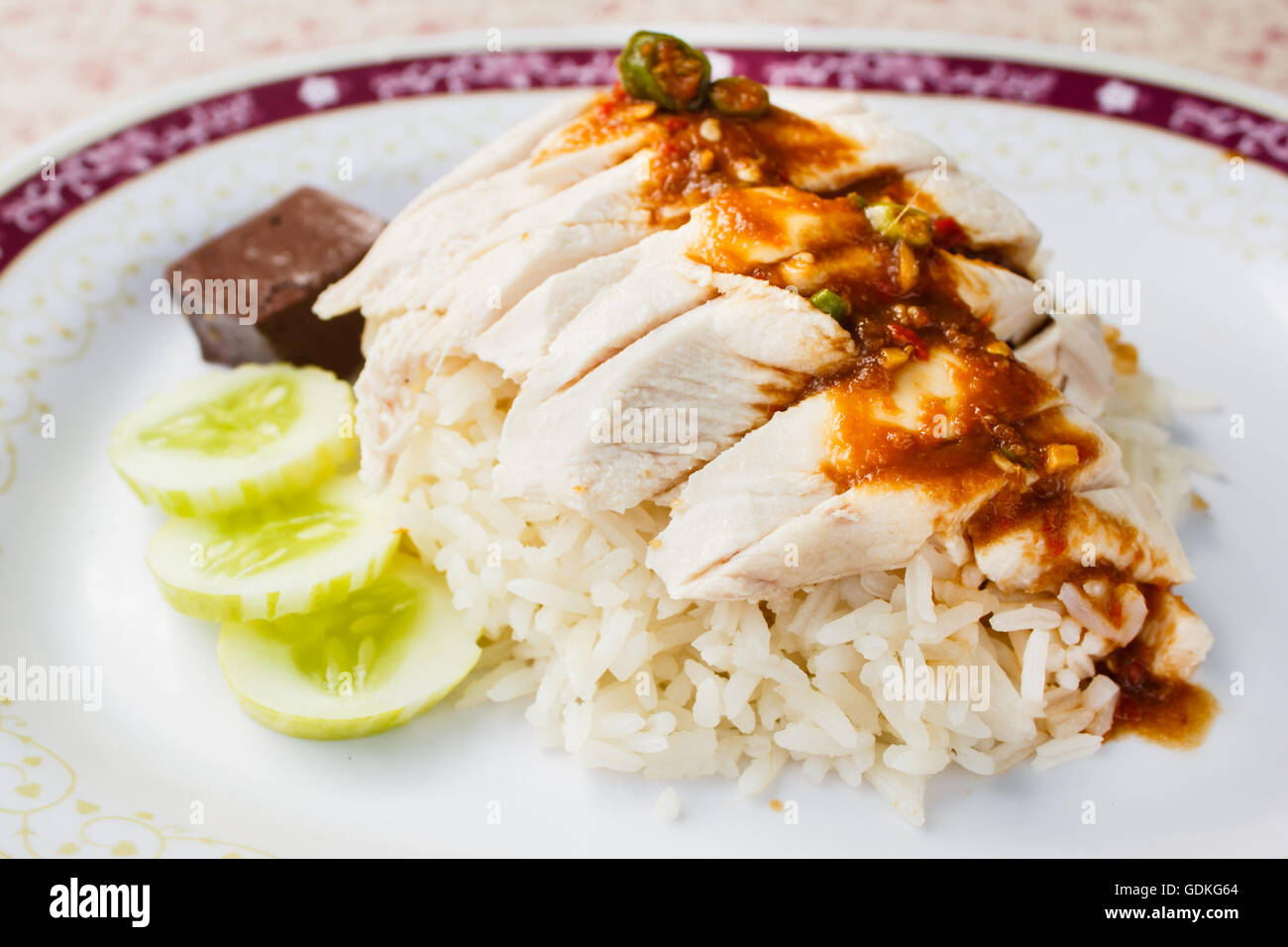 Hainanese chicken rice or Steam chicken with rice Stock Photo - Alamy