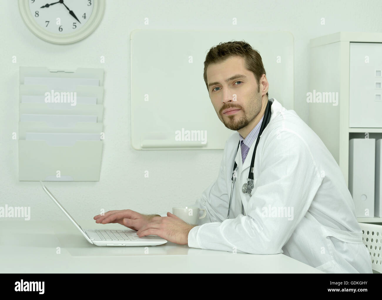 Medical doctor working with laptop Stock Photo - Alamy