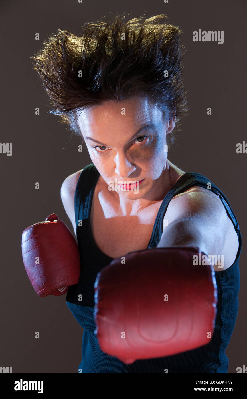 One woman angry boxing gloves hi-res stock photography and images - Alamy