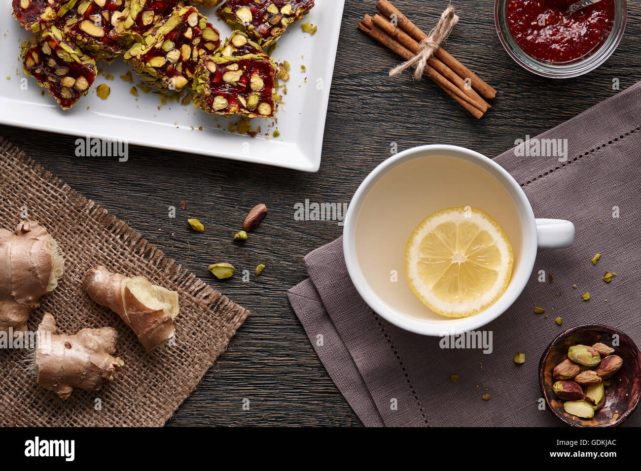 Cup of ginger tea with lemon and turkish delight Stock Photo - Alamy