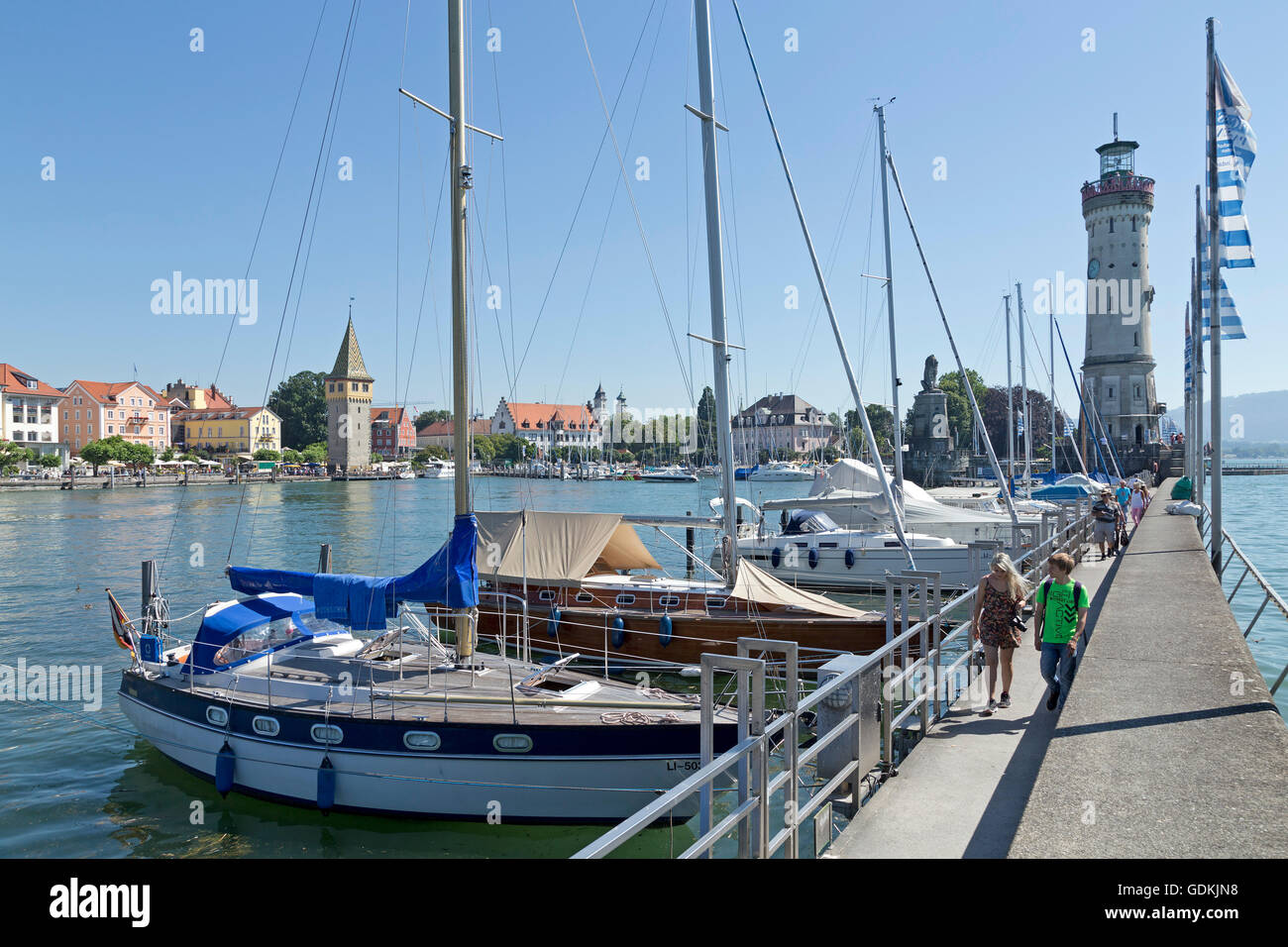 Lindau harbour lighthouse flags hi-res stock photography and images - Alamy