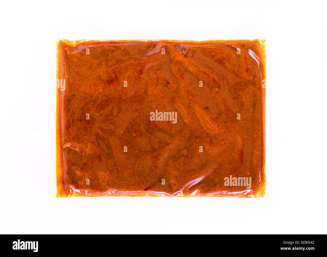Curry in a bag on a white background Stock Photo - Alamy