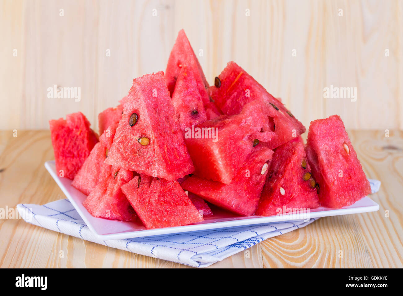 Watermelon red meat slices on a plate Stock Photo - Alamy