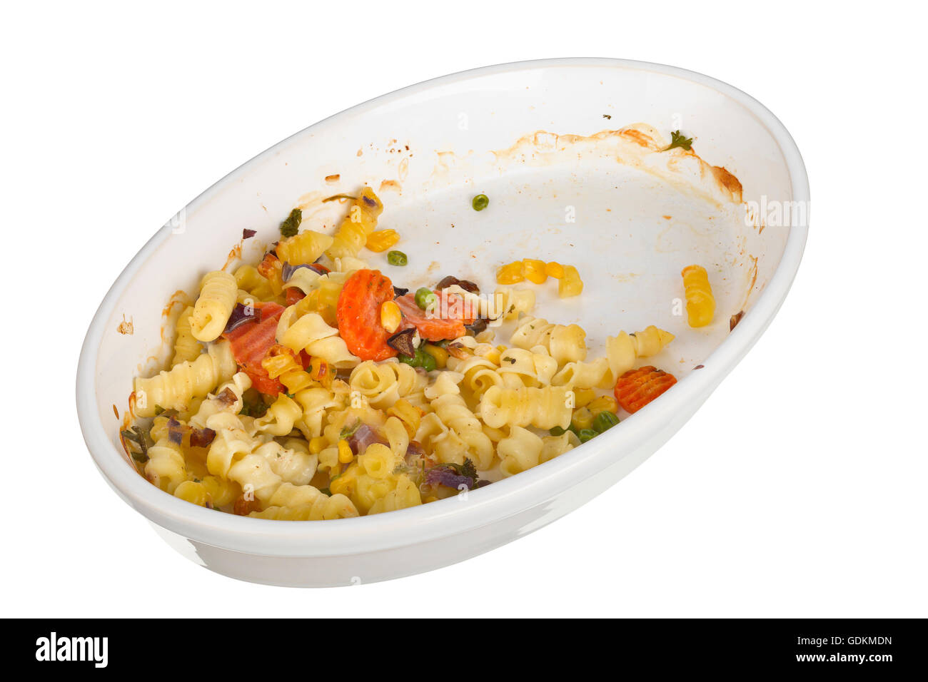 Pasta with cheese gratain in an oval dish isolated on white background ...