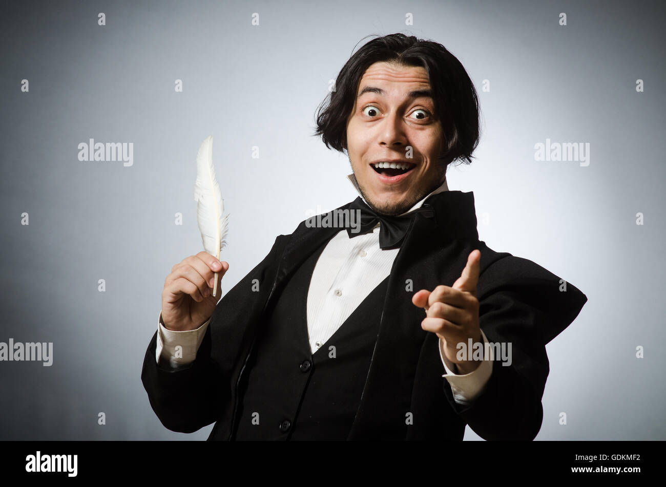 Funny writer with quill in vintage concept Stock Photo - Alamy