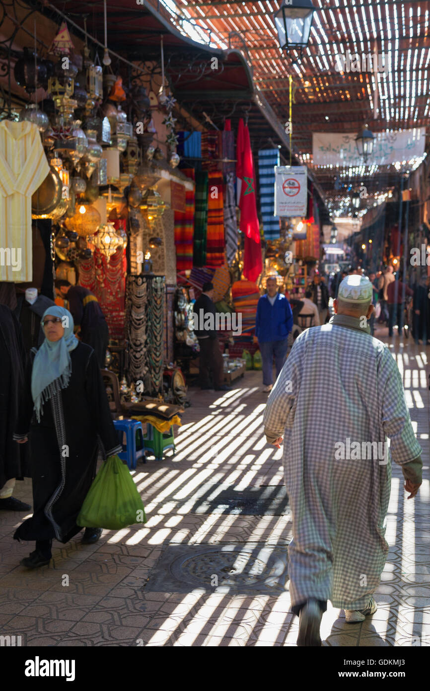 Locals walking through the souks in Marrakech, Morocco Stock Photo - Alamy