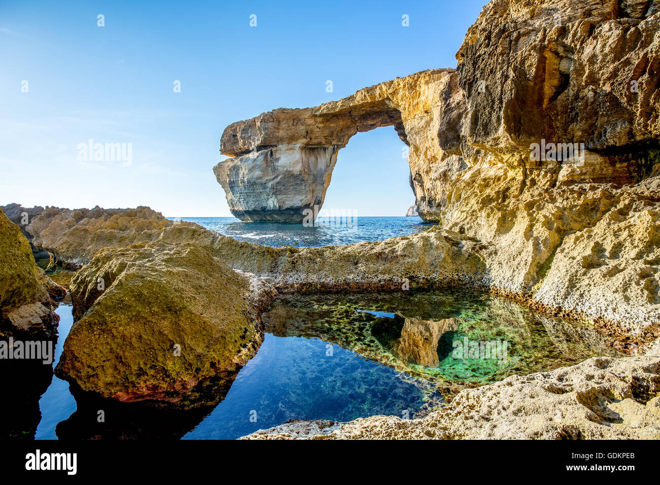 Azure Window, famous stone arch on Gozo island with reflection, Malta ...