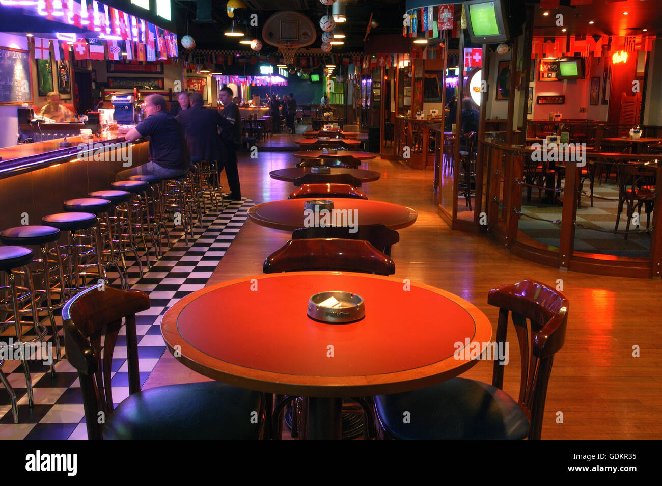 Tables at a bar Stock Photo - Alamy