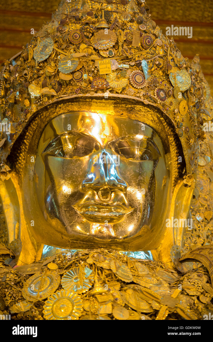 The Mahamuni Buddha at the Mahamuni temple in the City of Mandalay in ...