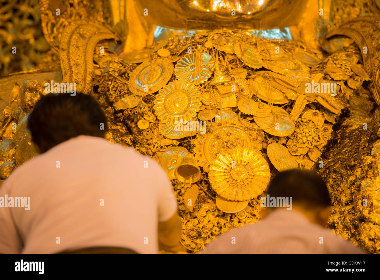 The Mahamuni Buddha at the Mahamuni temple in the City of Mandalay in ...