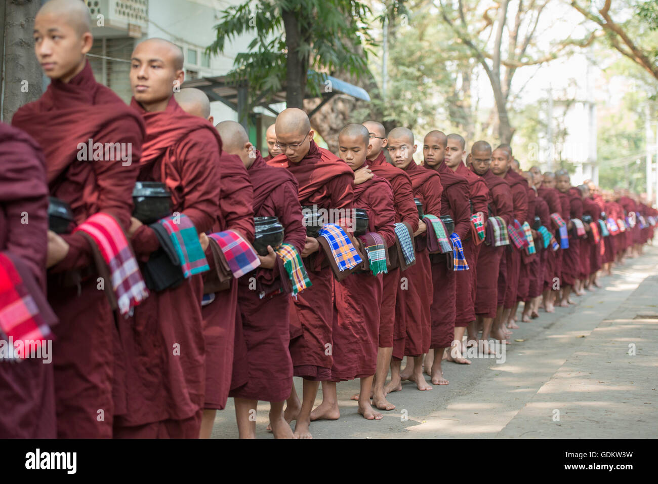 monks are on the way to the lunch at the Mahagandayon Monastery in ...
