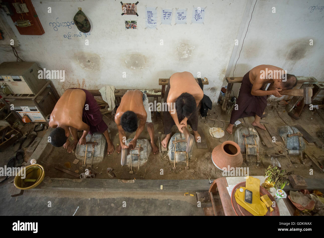 workers pound sheets of Gold leaf at a Gold pounder Factory the City of ...