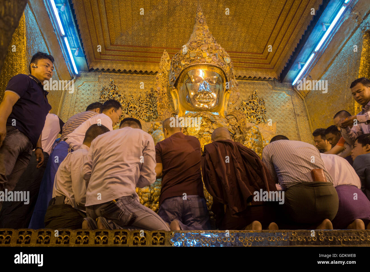 The Mahamuni Buddha at the Mahamuni temple in the City of Mandalay in ...