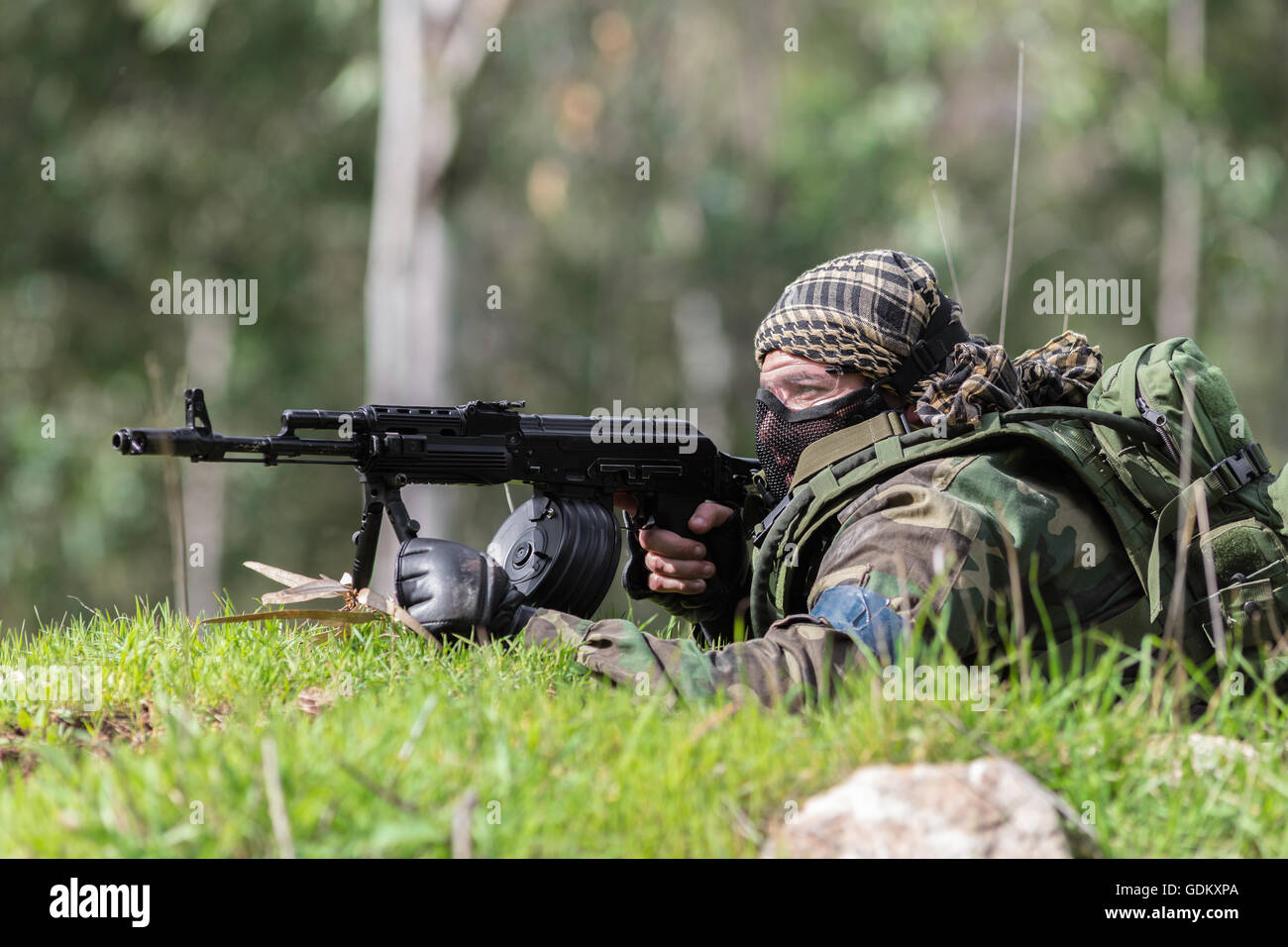 men in military uniform with weapon on a mission Stock Photo - Alamy