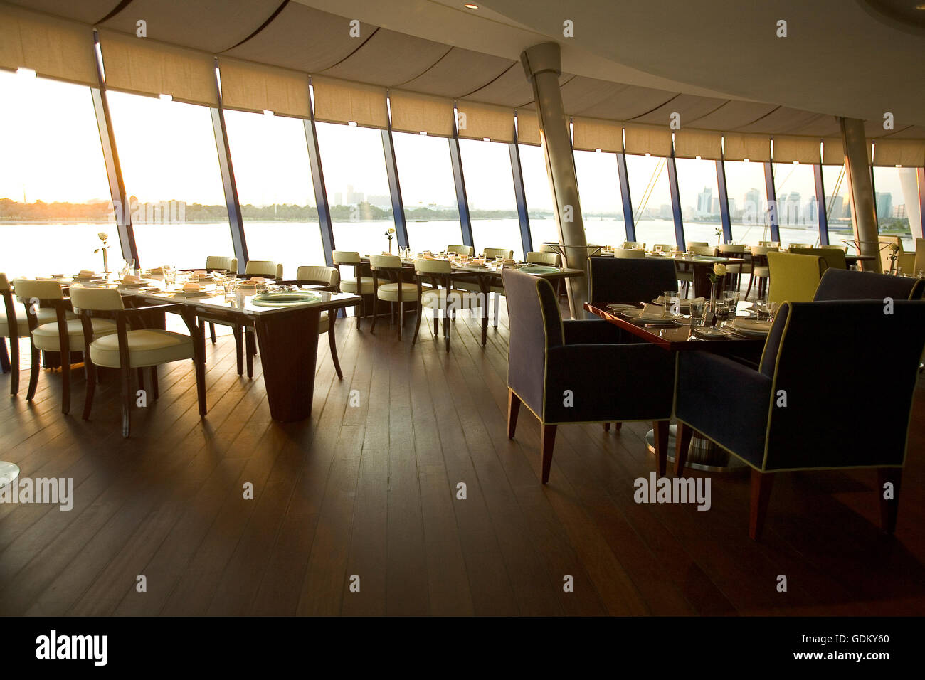 Tables at the Aquarium restaurant, Creek and Golf Club, Dubai, UAE ...