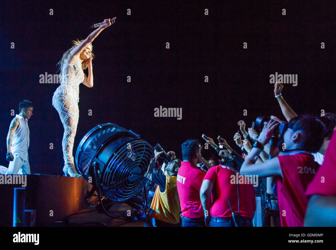 J-Lo performing at Dubai World Cup 2014 concert in Meydan, Dubai, UAE ...