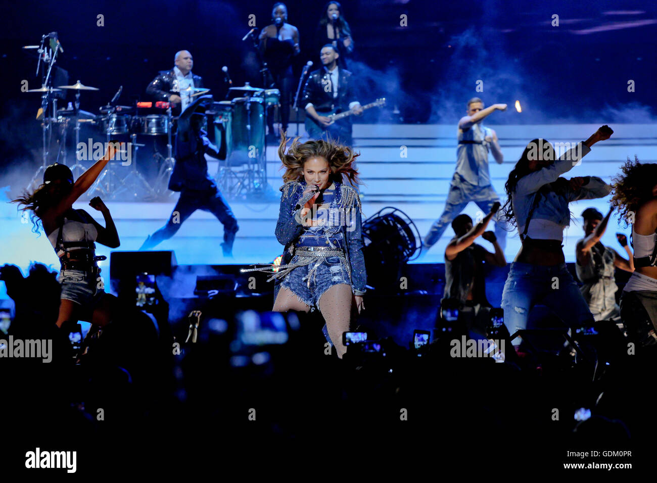 J-Lo performing on stage at Dubai World Cup 2014 concert in Meydan ...
