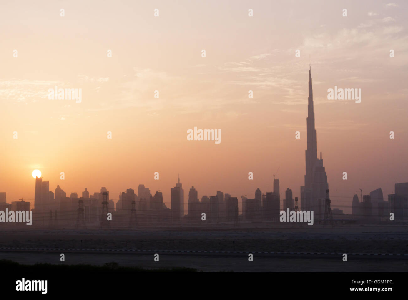 The sun sets over the Dubai Skyline, Dubai, UAE Stock Photo - Alamy