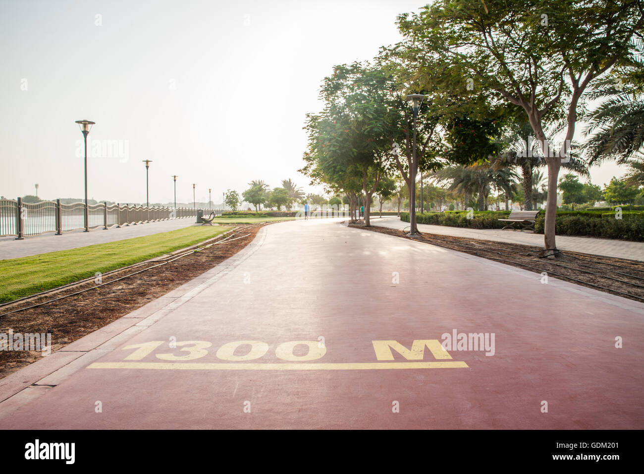 Running track at Al Barsha Pond Park, Dubai, UAE Stock Photo - Alamy