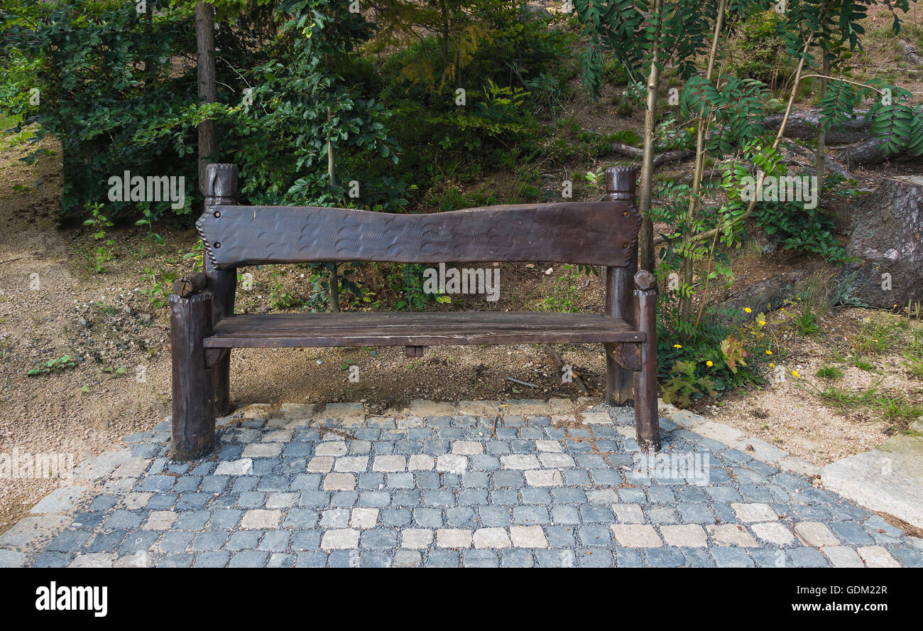 Bench in the woods hi-res stock photography and images - Alamy