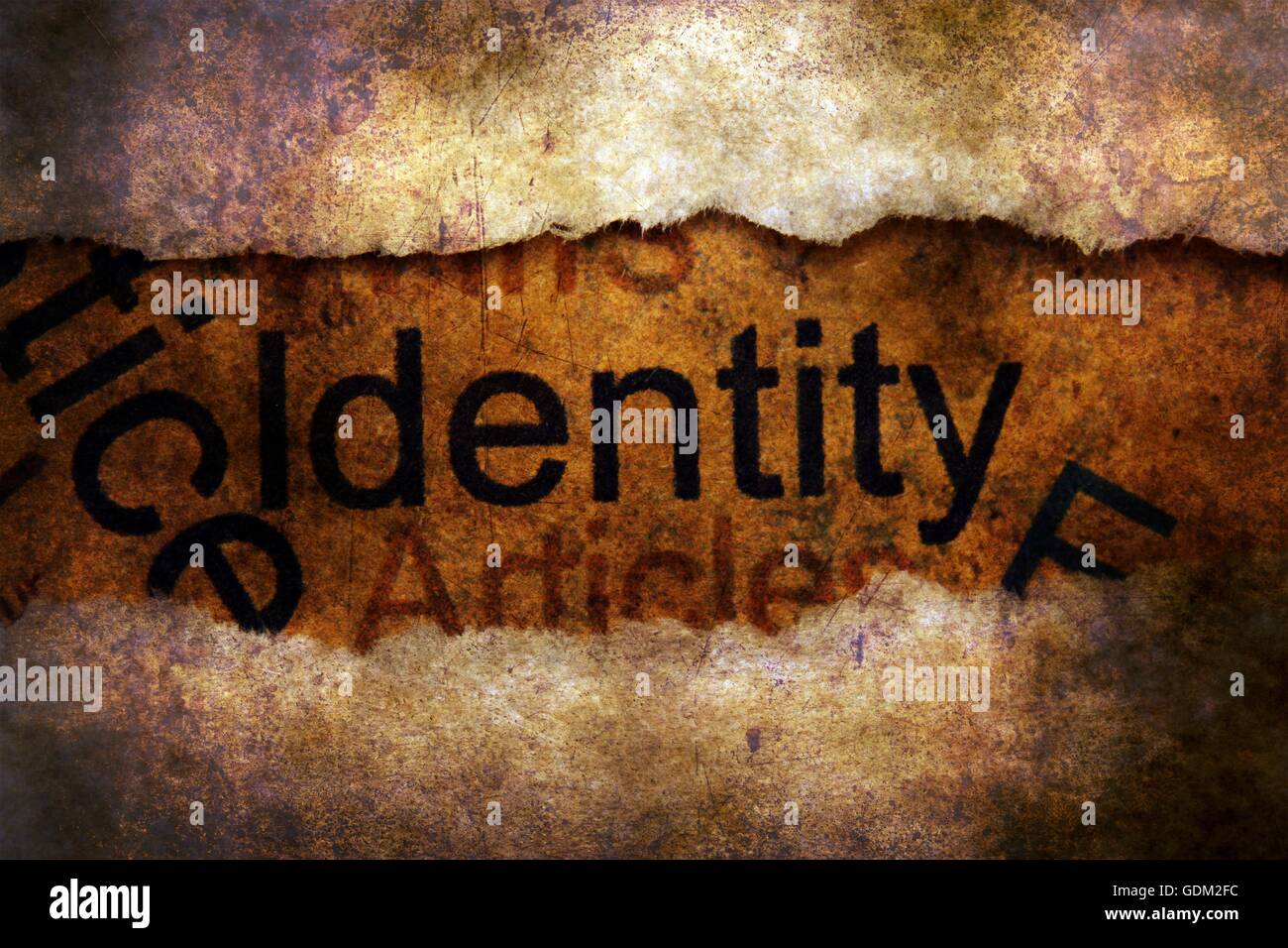 Identity text on torn paper concept Stock Photo - Alamy