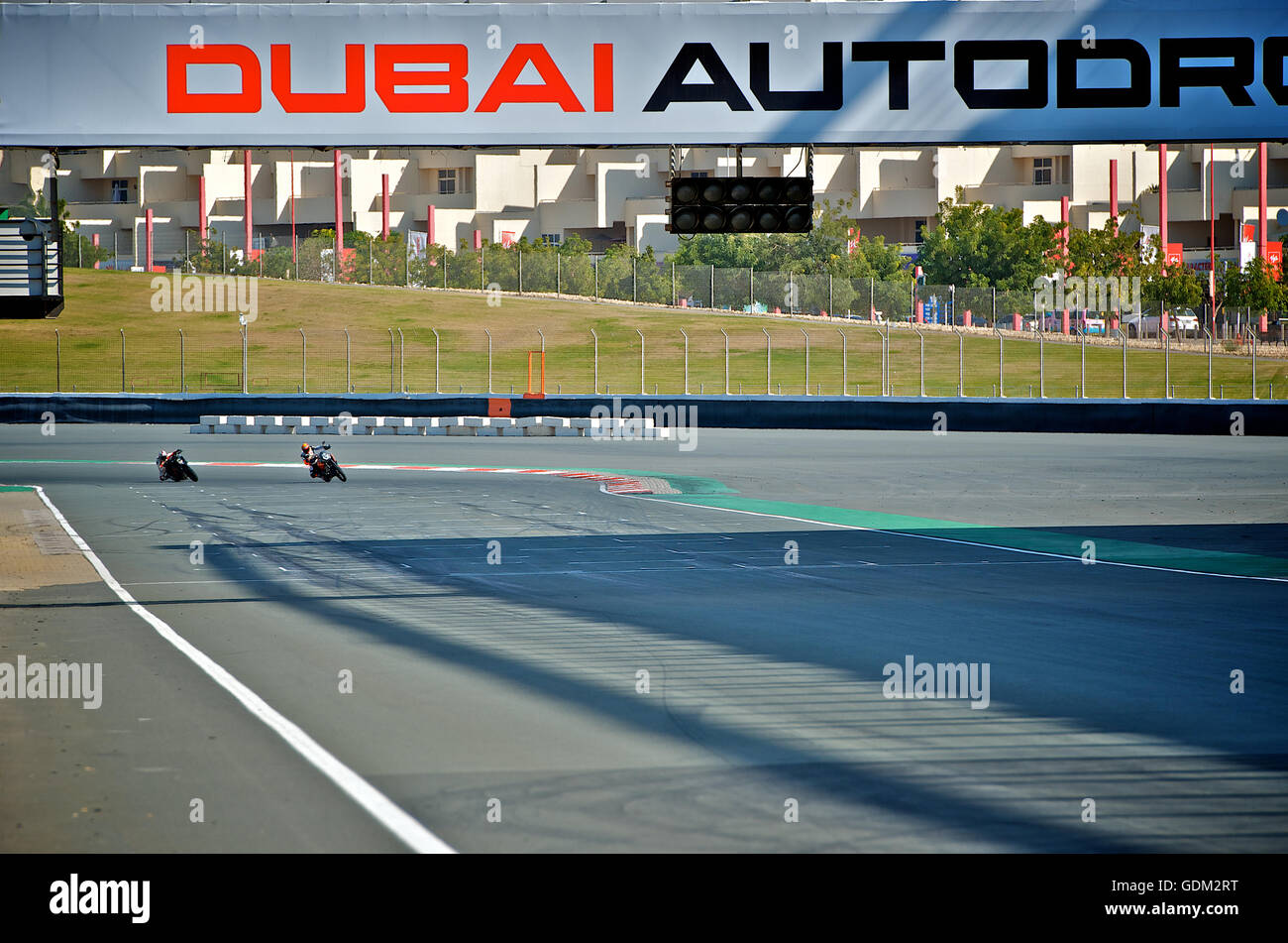 Dubai Autodrome track with two motorcycles on the turn Stock Photo - Alamy