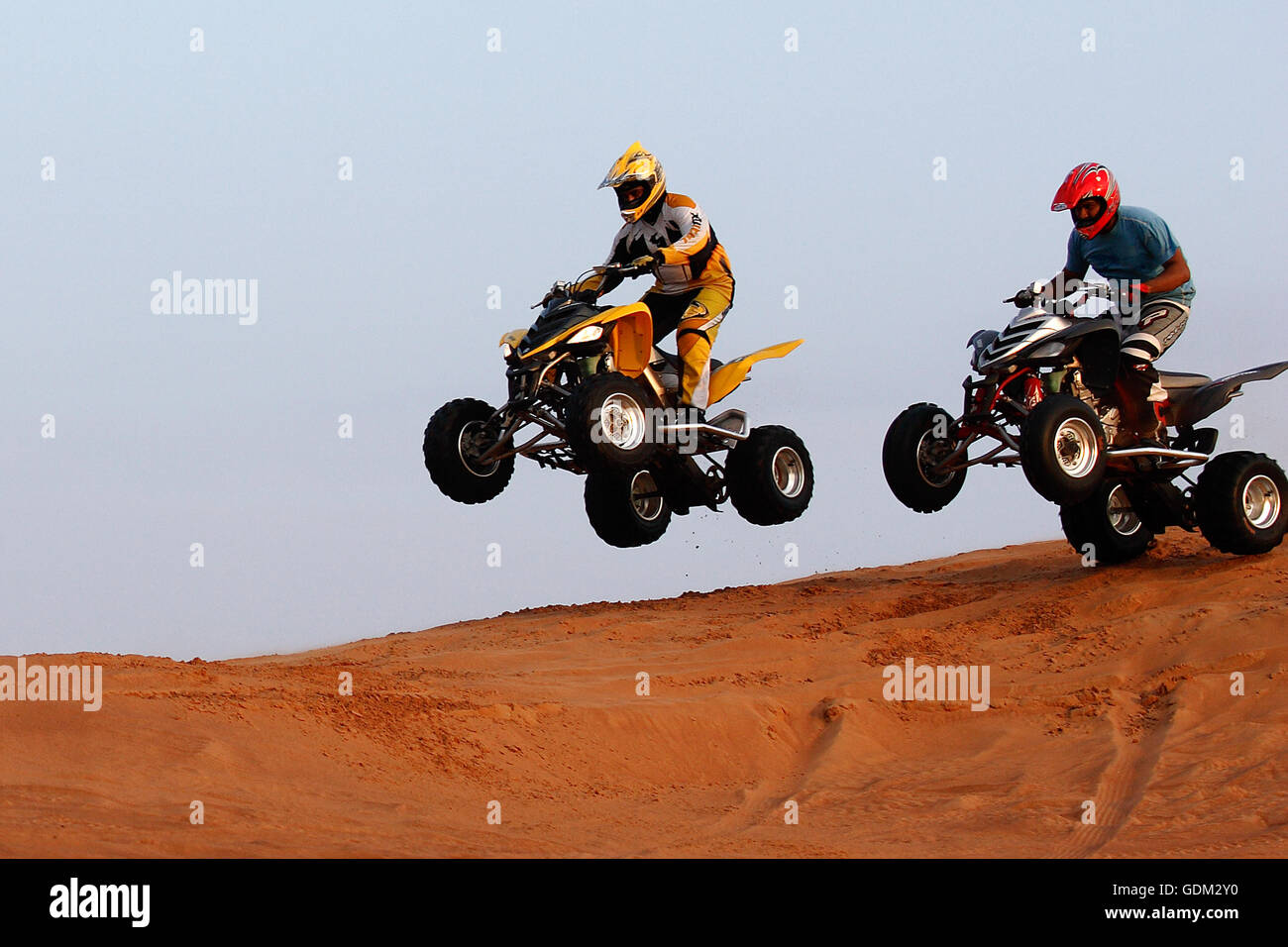 Four wheel racers motocross through thedesert. Dubai, UAE Stock Photo ...