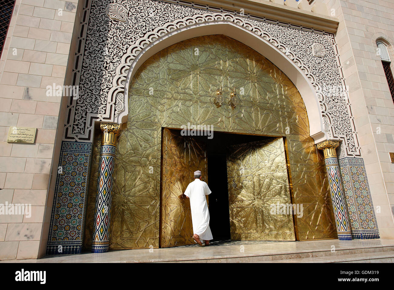 Omani man entering the Mosque for prayer on a Friday, Oman Stock Photo ...