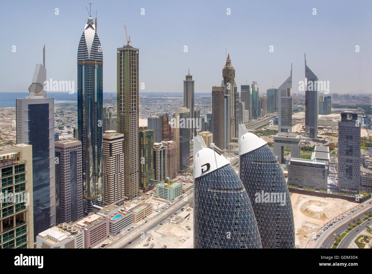 The towers of Sheikh Zayed Road with stock exchange in DIFC. Park ...