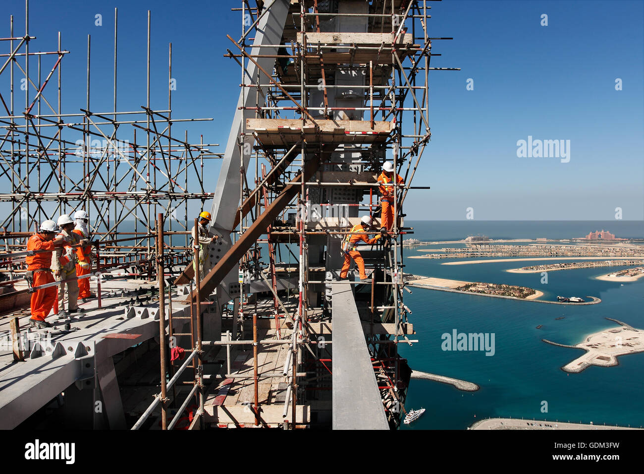 Infinity towers construction site in Dubai Marina with Palm Jumeirah in ...